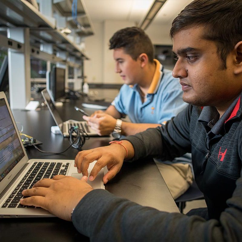 Two Students work in the Power Lab | Min H. Kao Department of ...