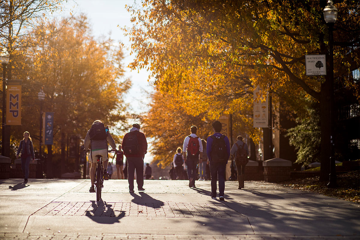 Students Walk Along Student Campus | Min H. Kao Department of ...
