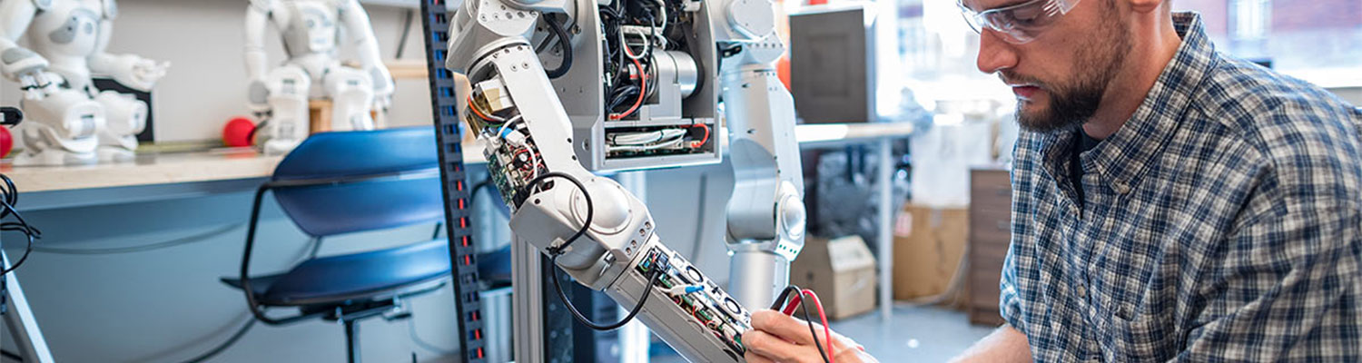 Grad Student working with Robot | Min H. Kao Department of Electrical ...